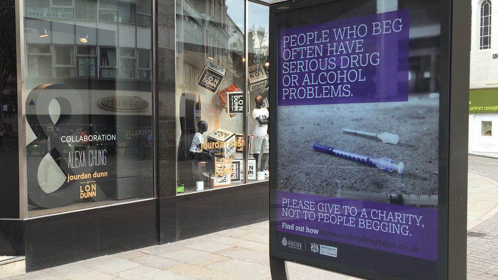 'Demonising' Nottingham anti-begging posters reworded - BBC News