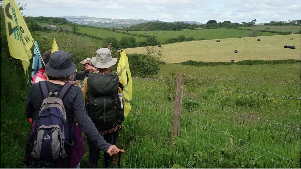 G7 Cornwall: Climate march from Plymouth to Carbis Bay - BBC News