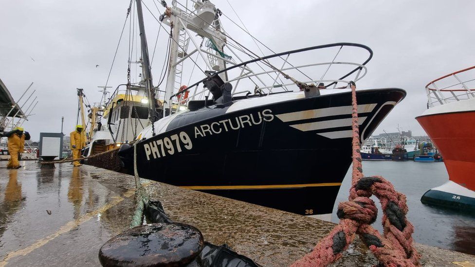 Boat that helped save 39 migrants returns to Plymouth - BBC News