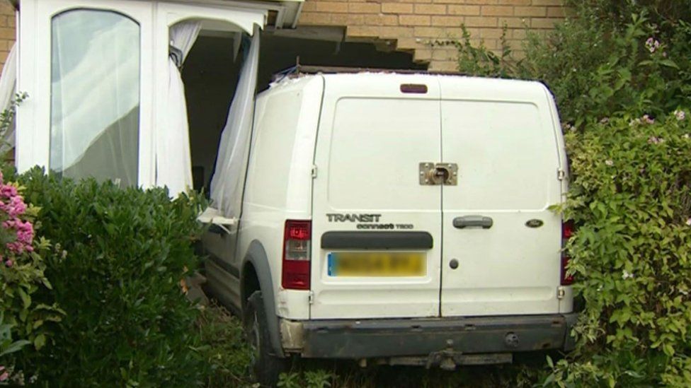 Boy, 15, arrested after van house crash in Leicestershire - BBC News