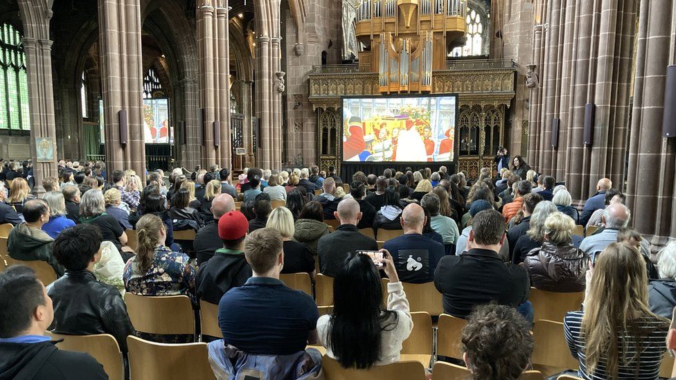 Queen's funeral: Thousands watch on Manchester big screens - BBC News