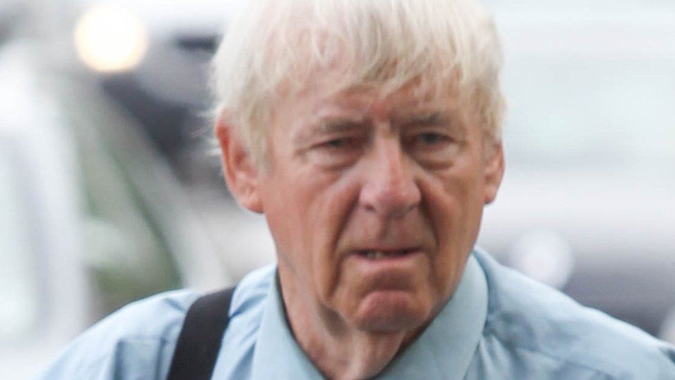 Ex-football coach Eric Cooper cleared of indecent assault - BBC News