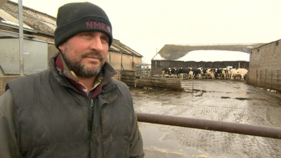 Snowed-in farmer throws away 8,000 litres of milk - BBC News