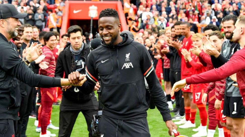 Liverpool: Origi departure confirmed as retained list released - BBC Sport