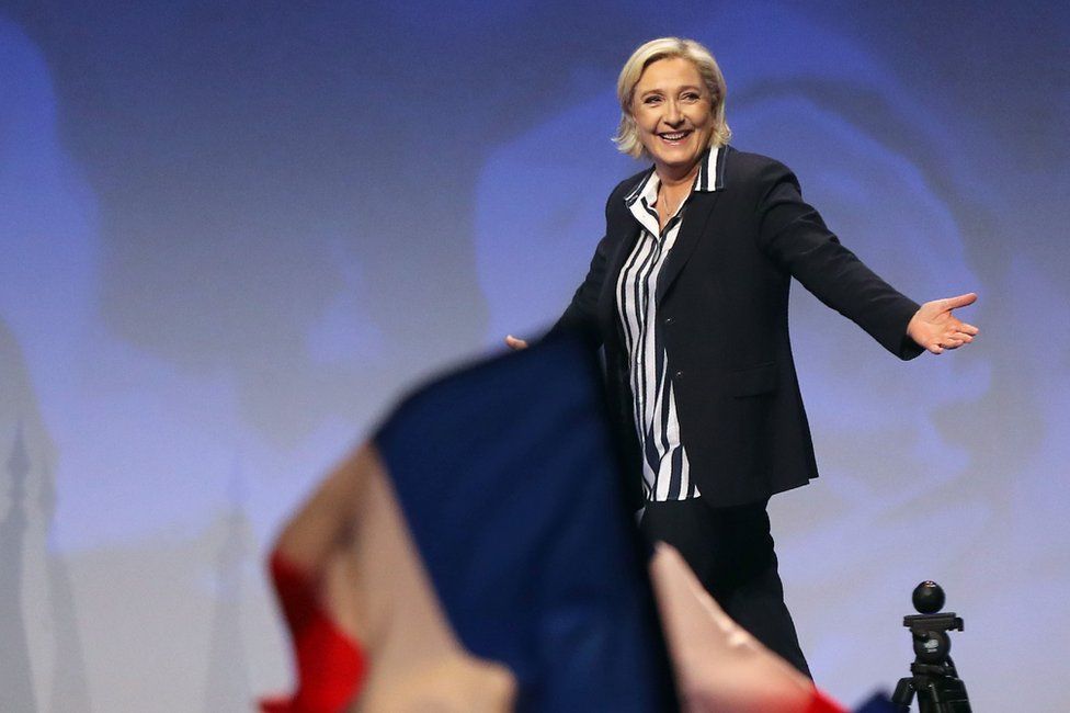 France election: Teenagers protest at candidates Macron and Le Pen ...