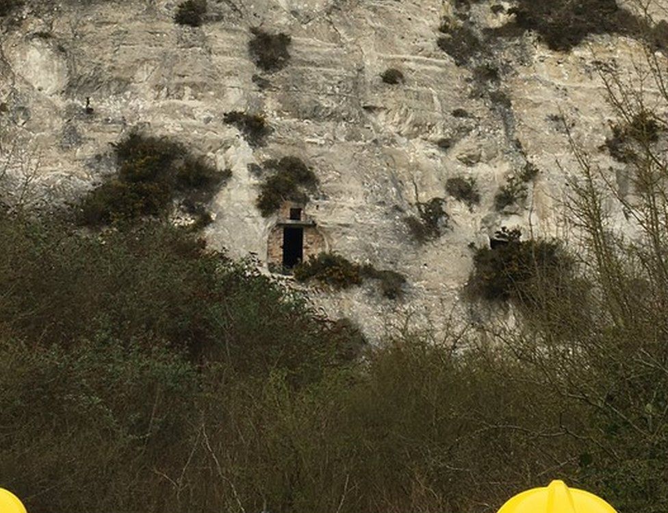 Girls rescued from Portsmouth cliff face cave - BBC News