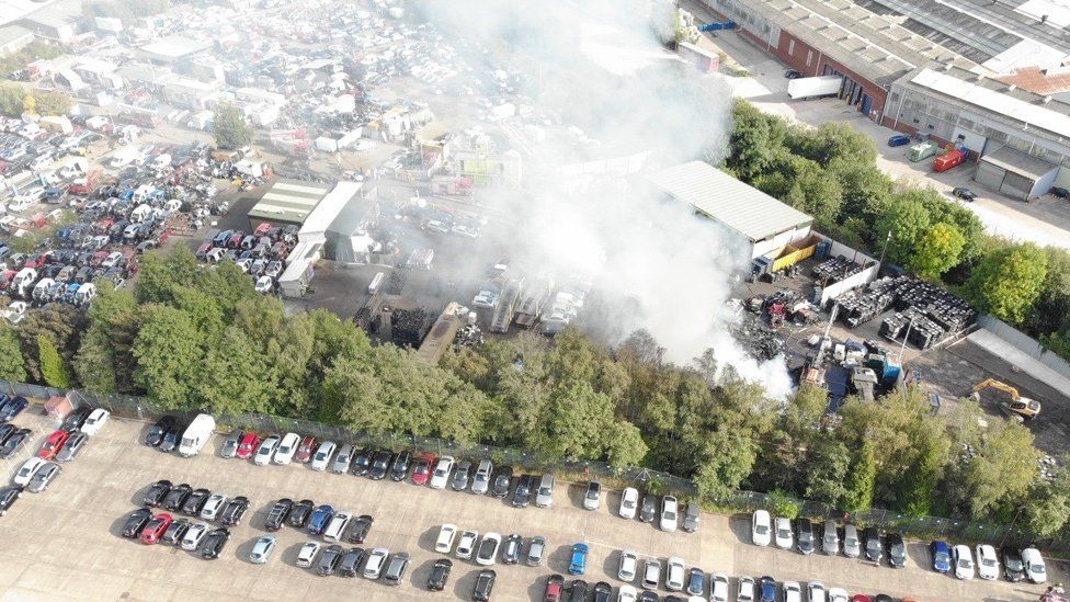 Walsall scrapyard fire consumes 100 cars - BBC News