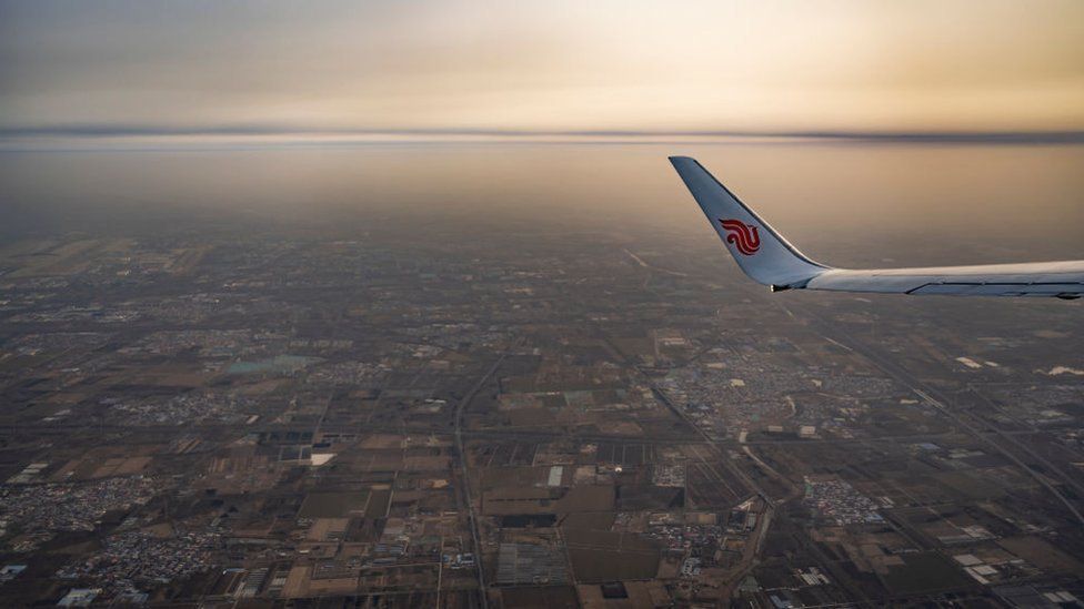 Why has the sun turned blue in Beijing? - BBC Newsround