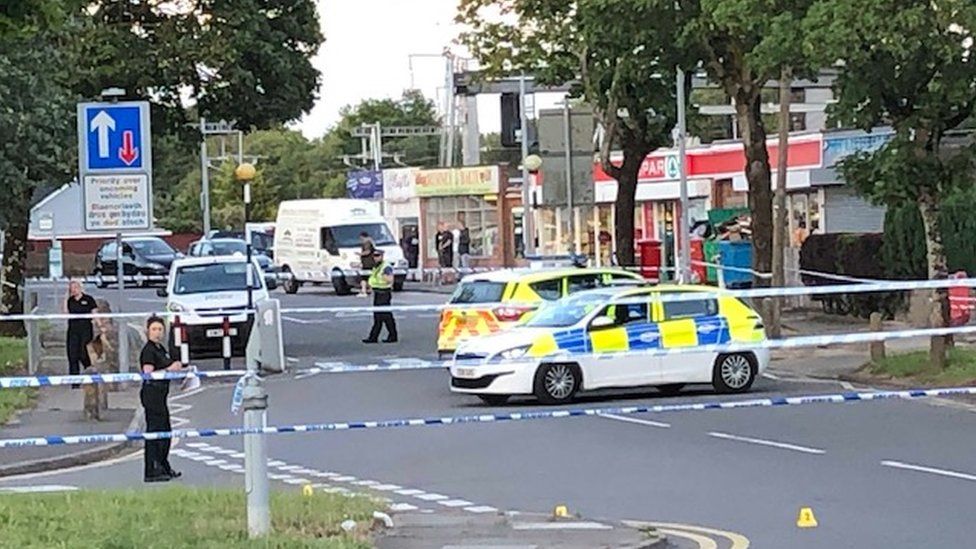 Cardiff street closed by police after 'gunshot' reports - BBC News
