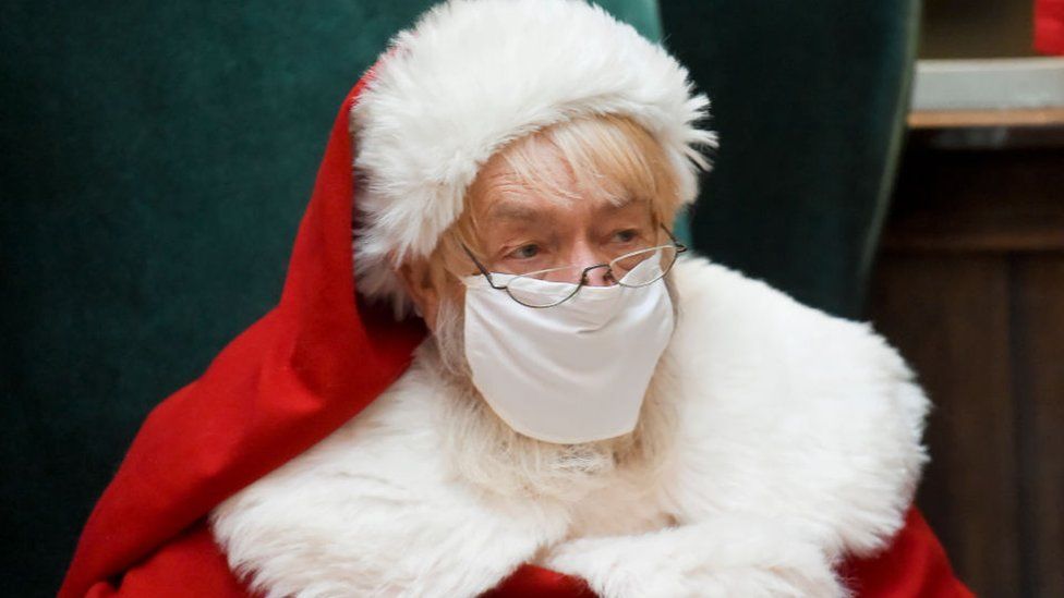 Plexiglass, sanitiser and masks: US mall Santas prepare for Christmas ...