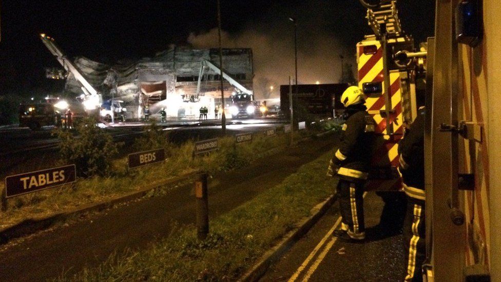 Exeter waste firm fire tackled by 20 fire crews - BBC News