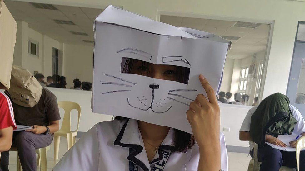 Students wear homemade 'anti-cheating' hats during exam - BBC Newsround