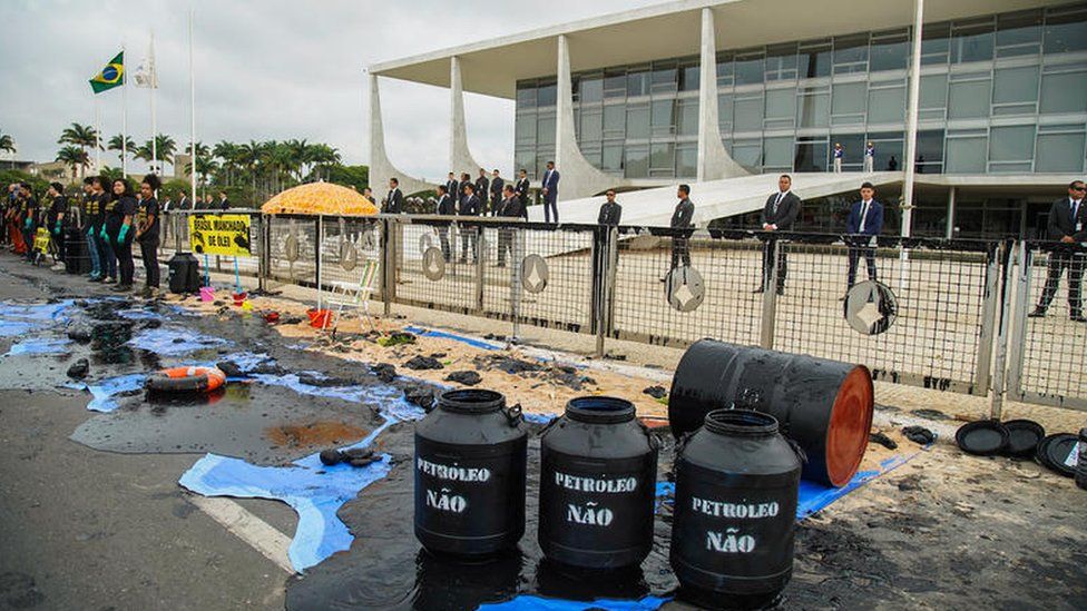 Brazil oil spill: Thousands help clean up environmental disaster - BBC ...