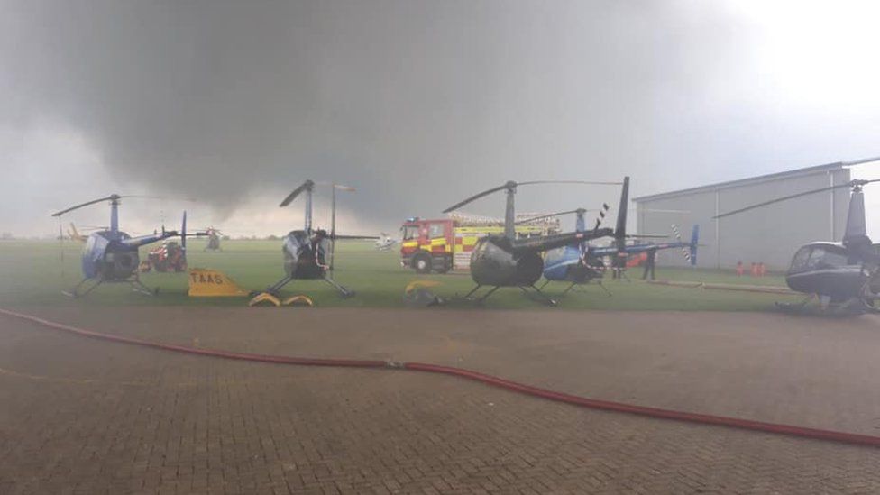 Sywell Aerodrome fire: Crews leave site of warehouse blaze - BBC News
