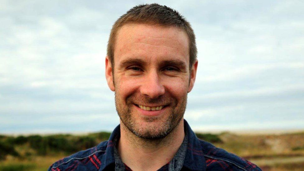 Tribute to biker killed in Moray collision - BBC News