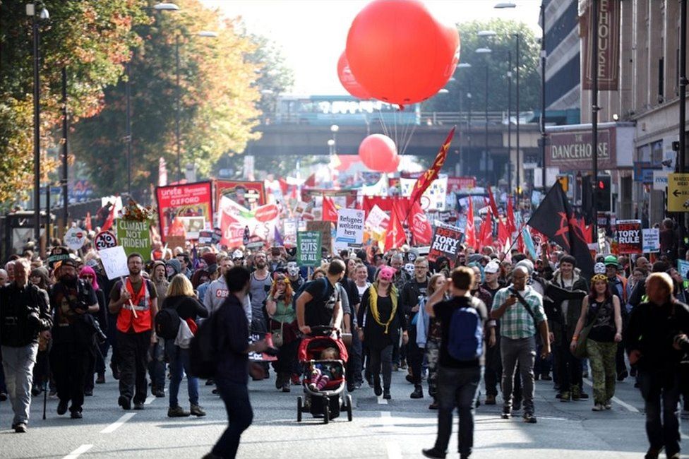 Manchester march: Large protest at Tory conference - BBC News