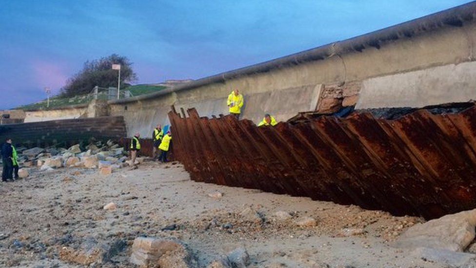 Southsea promenade flood defence wall collapses into sea - BBC News