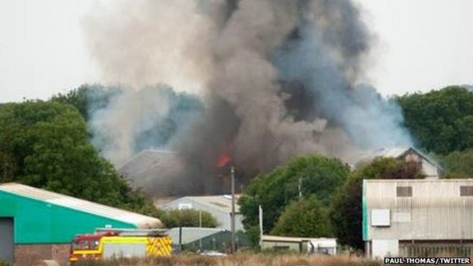 Fire crews still tackling blaze at Llandow recycling plant - BBC News