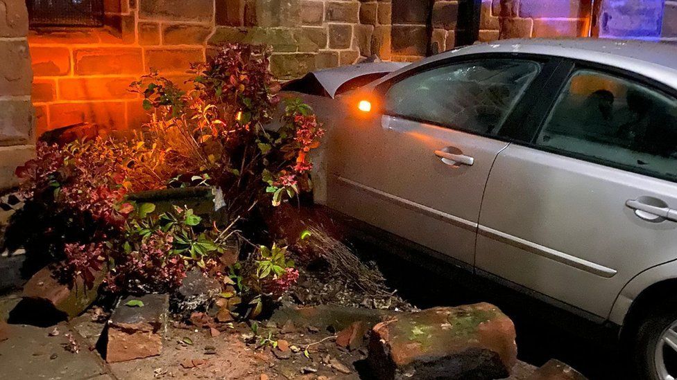 Driver smashes rare ancient cross in church crash - BBC News