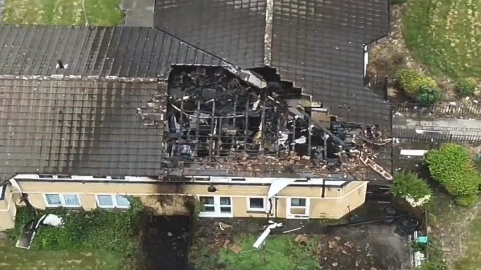 Two rescued as 30 firefighters tackle Highgate housing fire - BBC News