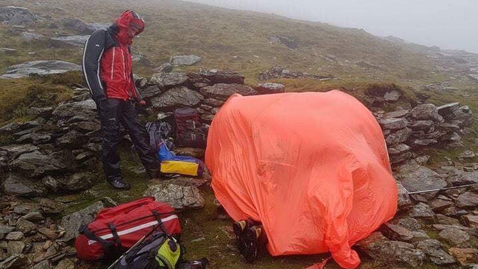 Storm Brian: Woman rescued from Snowdon after fall - BBC News