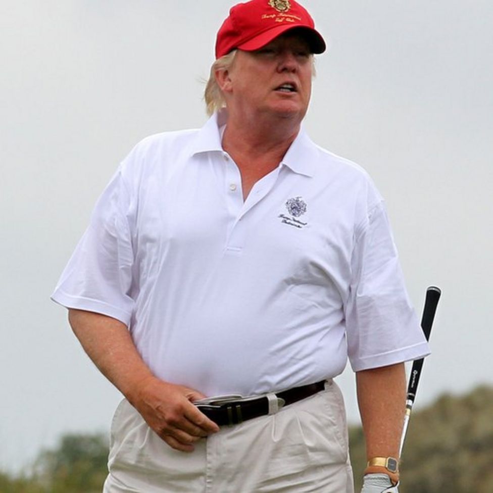 NI paper review: Trump's wall and a Christmas jumper - BBC News