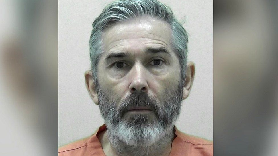 Life term for man who stabbed and locked partner in house - BBC News