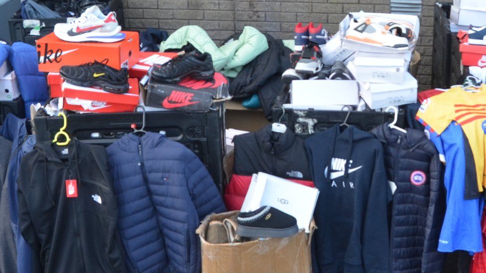 Man bailed over counterfeit goods seizure - BBC News