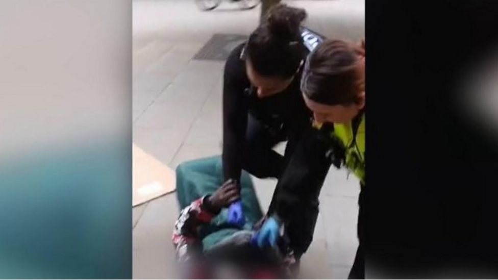 Greater Manchester Police officer drags homeless man along ground - BBC ...