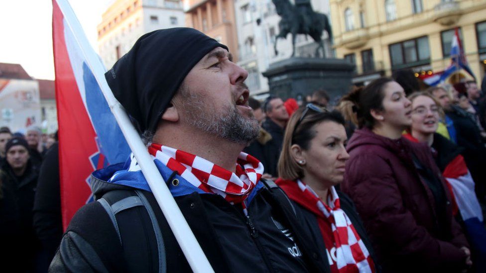 Covid-19: Why are there protests in Europe? - BBC Newsround