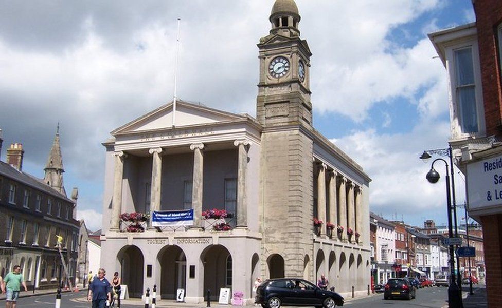 Isle of Wight museum reopens a year after cuts closure - BBC News