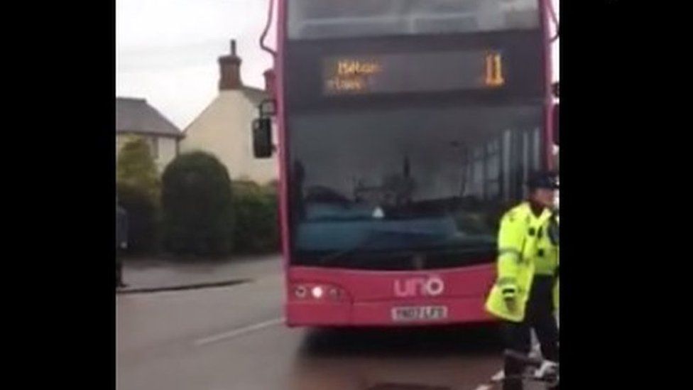 Bus driver 'who disturbed remembrance service' suspended - BBC News