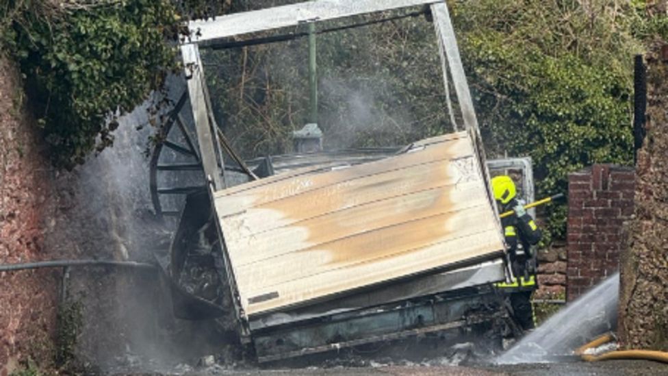 Van destroyed after catching fire in Paignton - BBC News