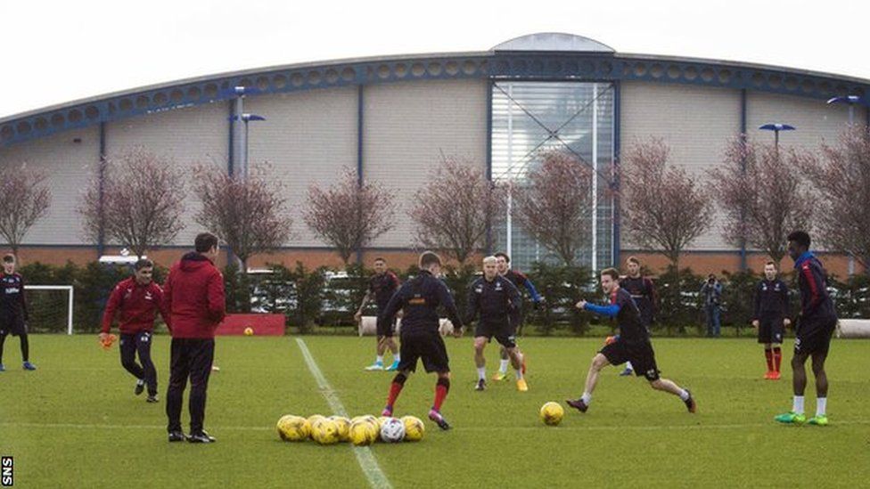 Firefighters tackle blaze at Rangers training centre - BBC News