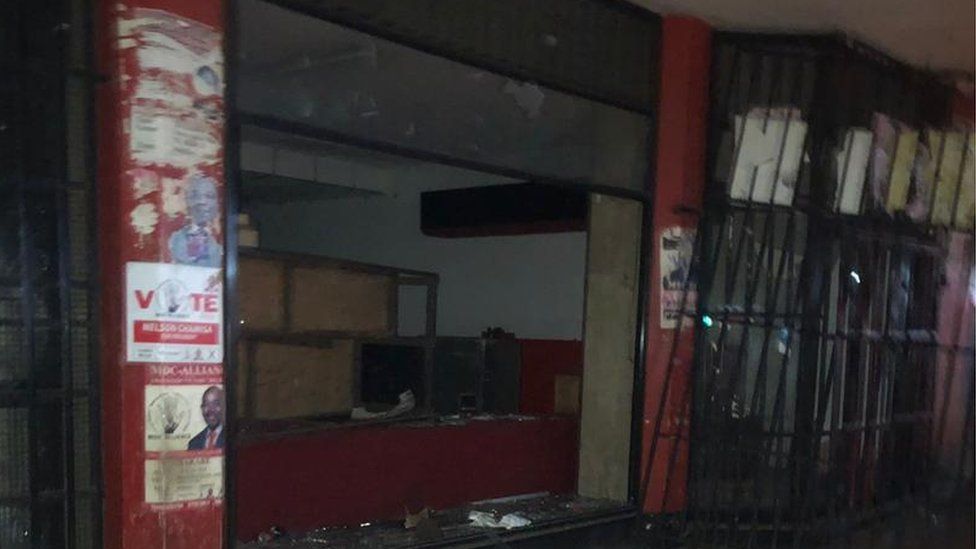 Zimbabwe fuel protests: MDC opposition office torched - BBC News