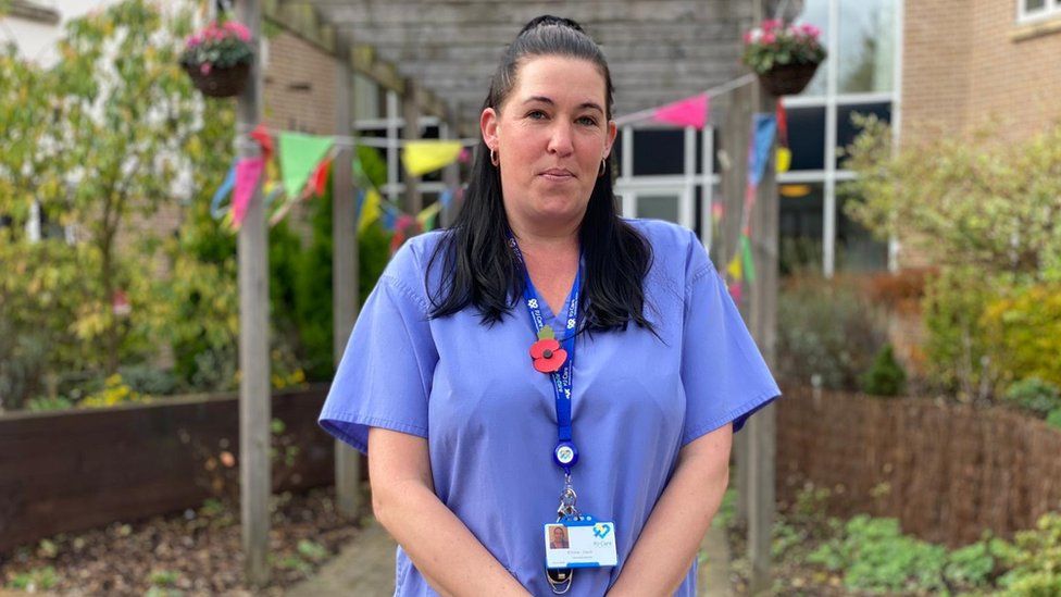 Covid-19: Care worker sells car won in vaccine jab raffle - BBC News