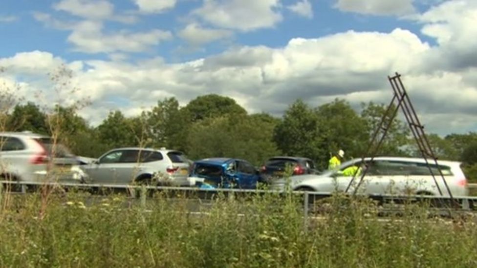 Five-car crash on the M23 in Surrey injures nine people - BBC News