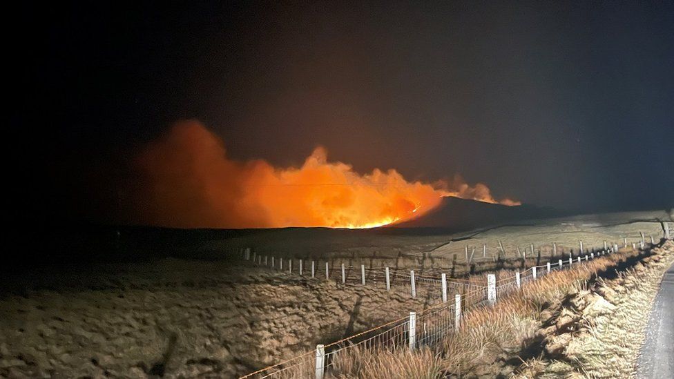 Crews battle wildfires in Western Isles and Highlands - BBC News