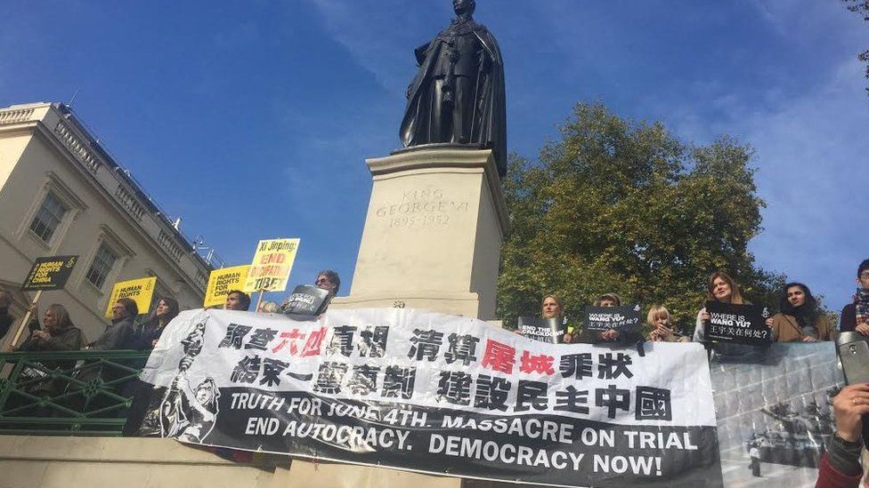 Met Police defends 'heavy-handed' arrest of Chinese protesters - BBC News