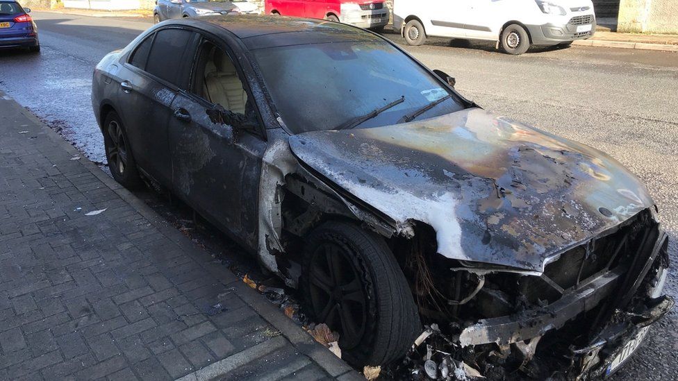 Lisnaskea: Car set on fire in 'sectarian hate crime' - BBC News