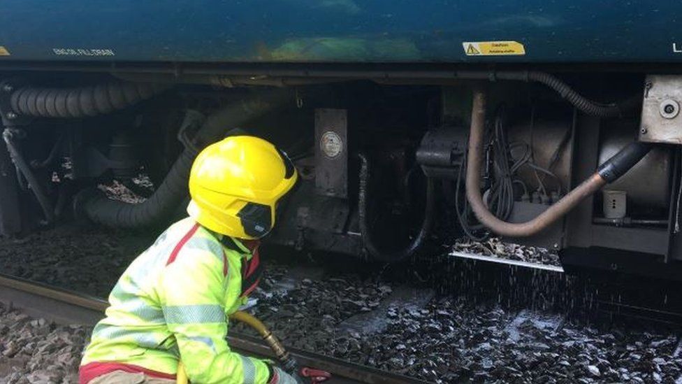 Passengers evacuated as train catches fire in Willaston - BBC News