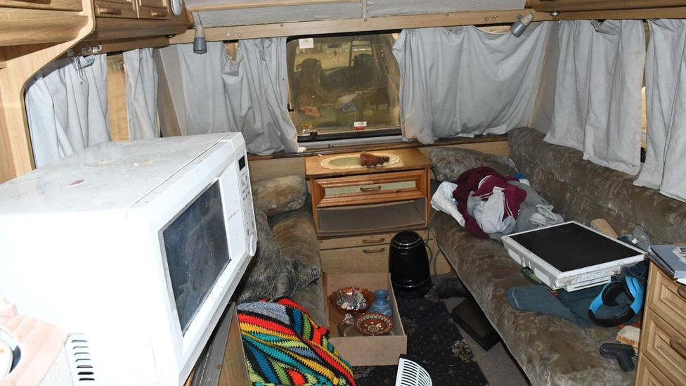 Man kept as slave in scrap yard caravan at Jersey Marine - BBC News