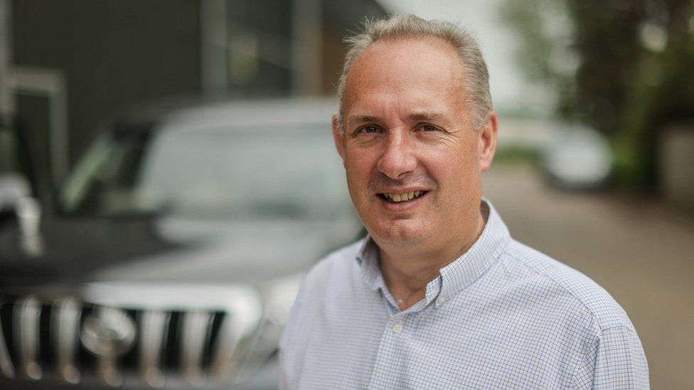 Convoys take farmers' donated pickups from Scotland to Ukraine - BBC News