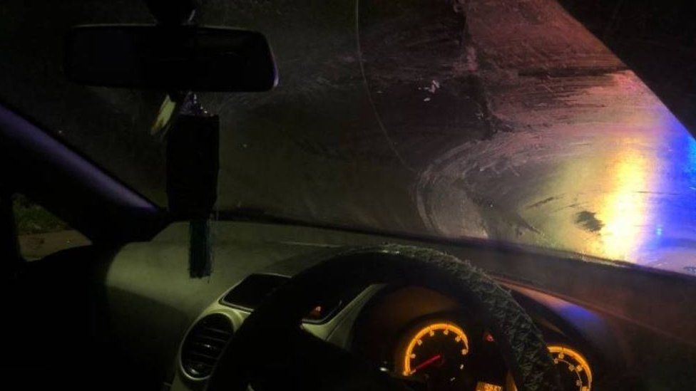 Wrong-way iced-up car driven at Peterborough police - BBC News