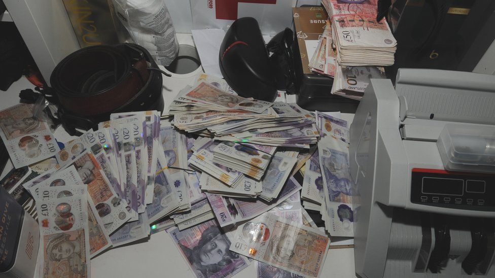 Amazon theft: Man arrested after stock stolen from Salford depot - BBC News