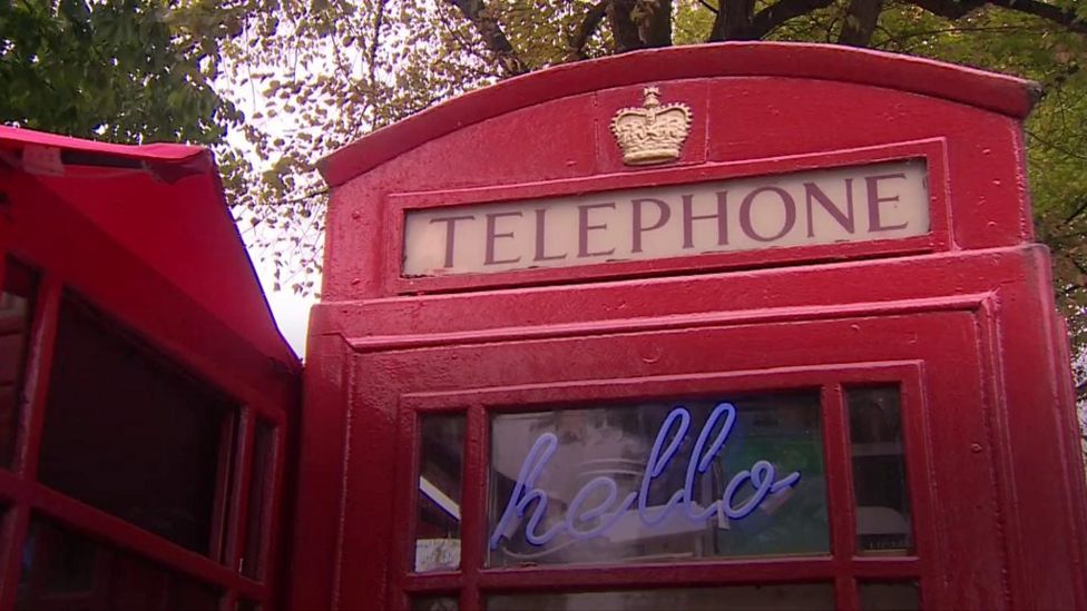 Adult books left in Hampshire village phone box cause a stir - BBC News