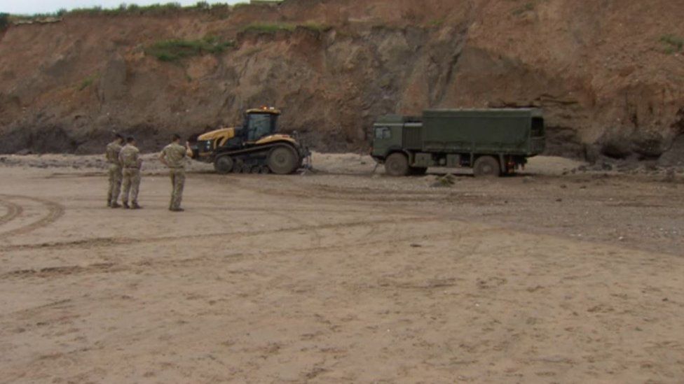 Farmer rescues bomb disposal truck stuck at Mappleton beach - BBC News