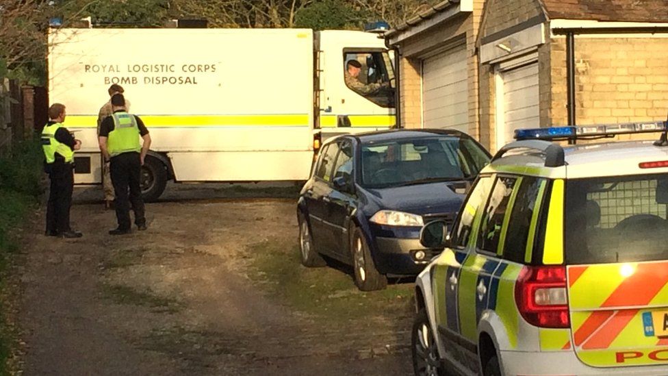 'Hand grenade' found inside tree in Ely garden - BBC News
