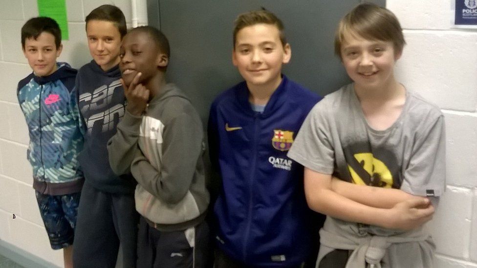 Boys praised for saving woman's life in Edinburgh - BBC News