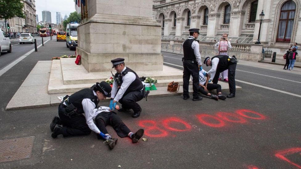 Two women arrested over Gaza protest at Cenotaph - BBC News